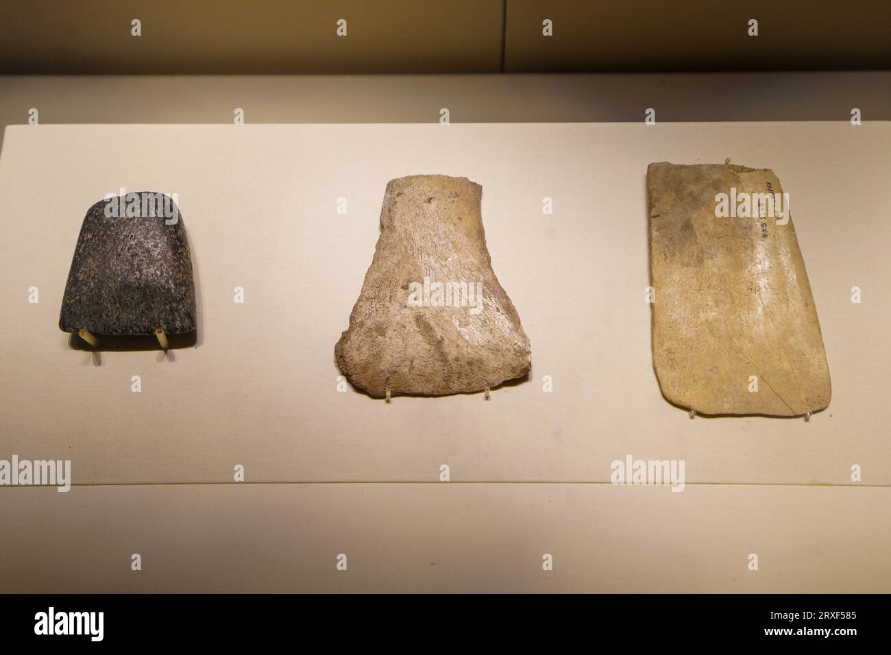 Beijing China, February 17, 2023: Western Zhou Stone Axe Bone Spade in ...