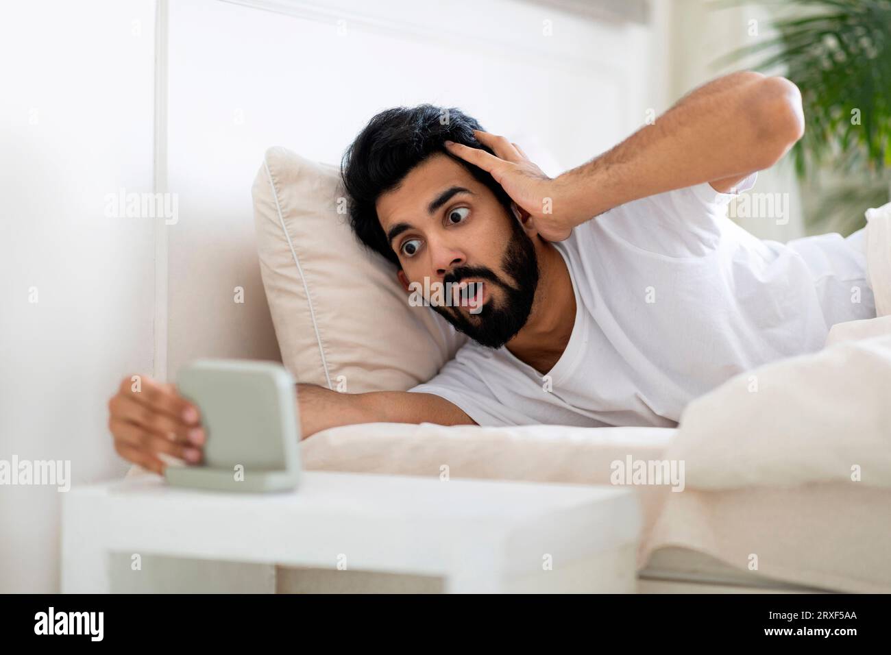 I'm Late. Overslept Indian Man Looking At Alarm Clock With Shock Stock ...