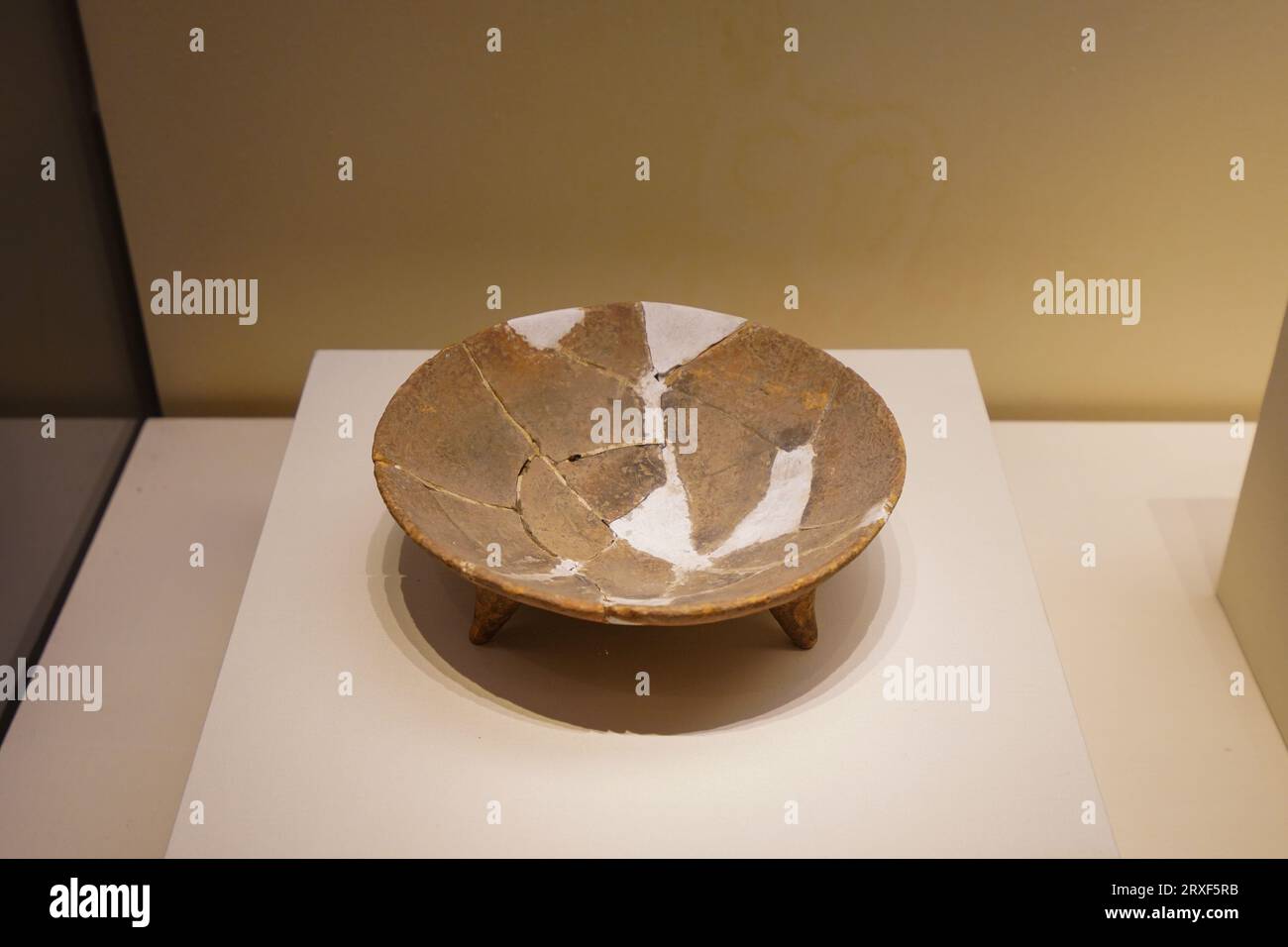 Beijing China, February 17, 2023: Three legged pottery bowl of Cishan ...