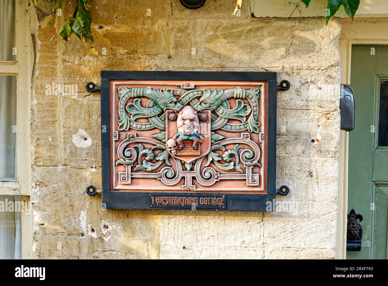 Unusual house sign Stock Photo - Alamy