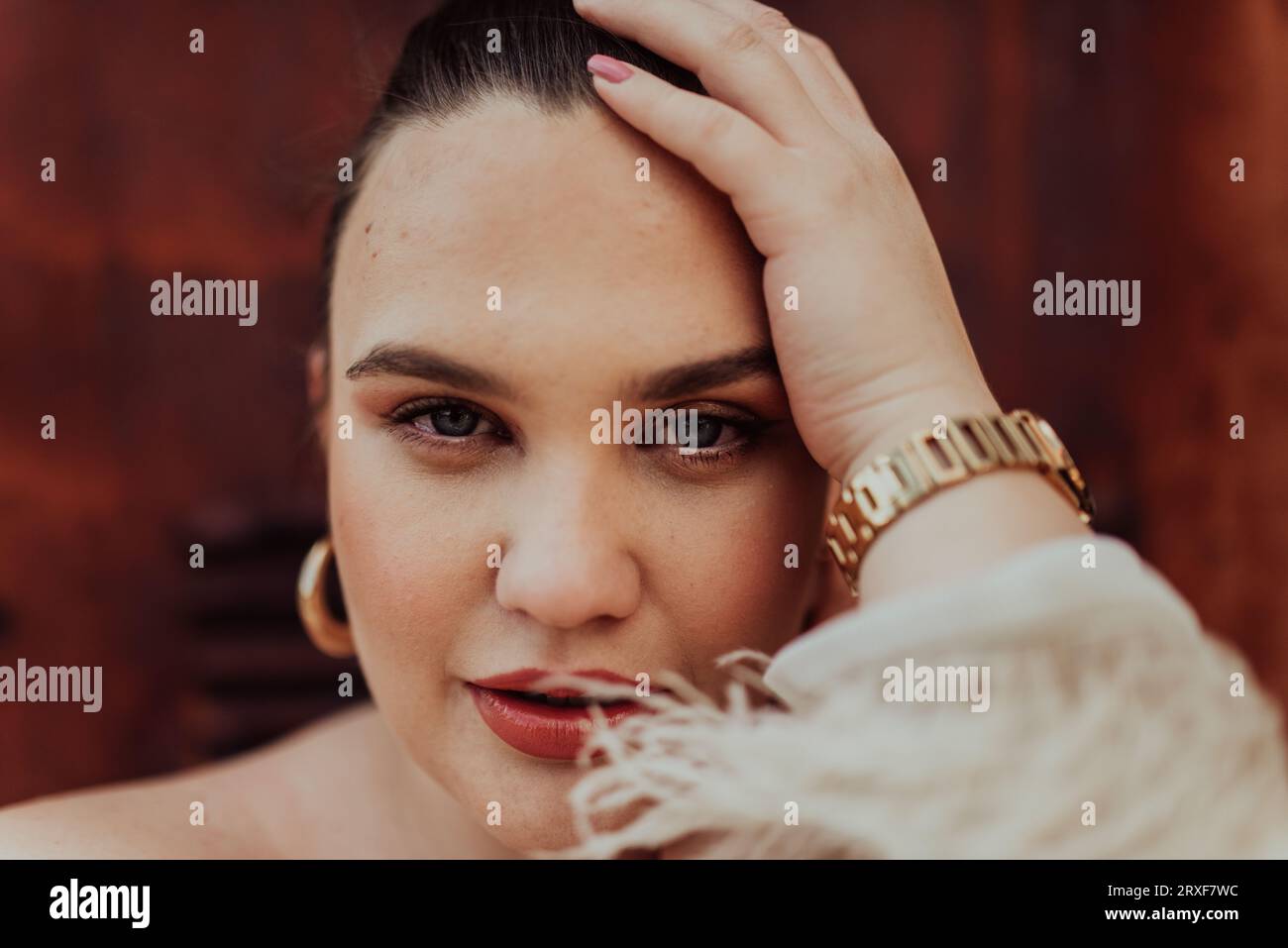 A close-up, unretouched portrait of a naturally beautiful young woman showcasing her authentic ...