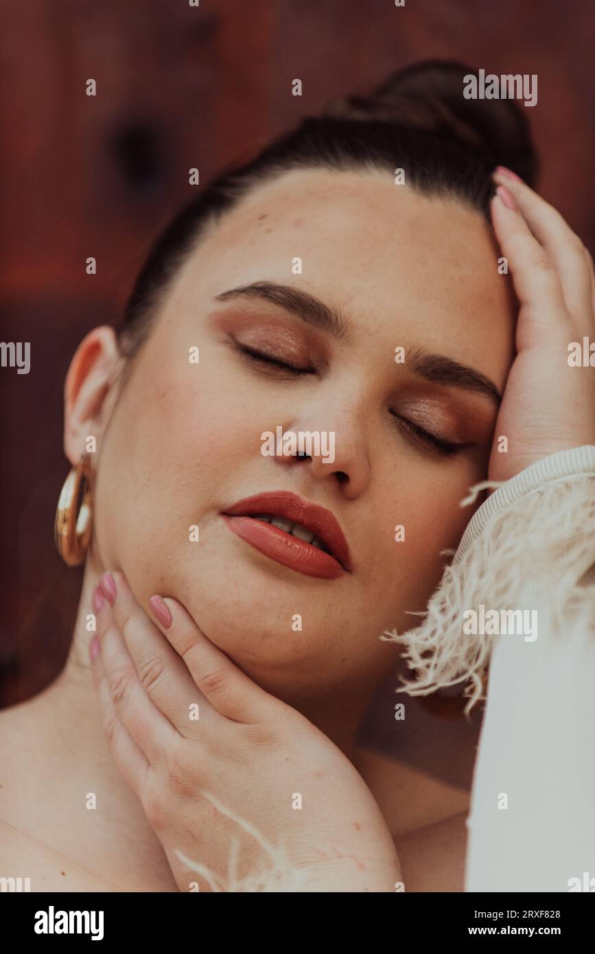 A close-up, unretouched portrait of a naturally beautiful young woman ...