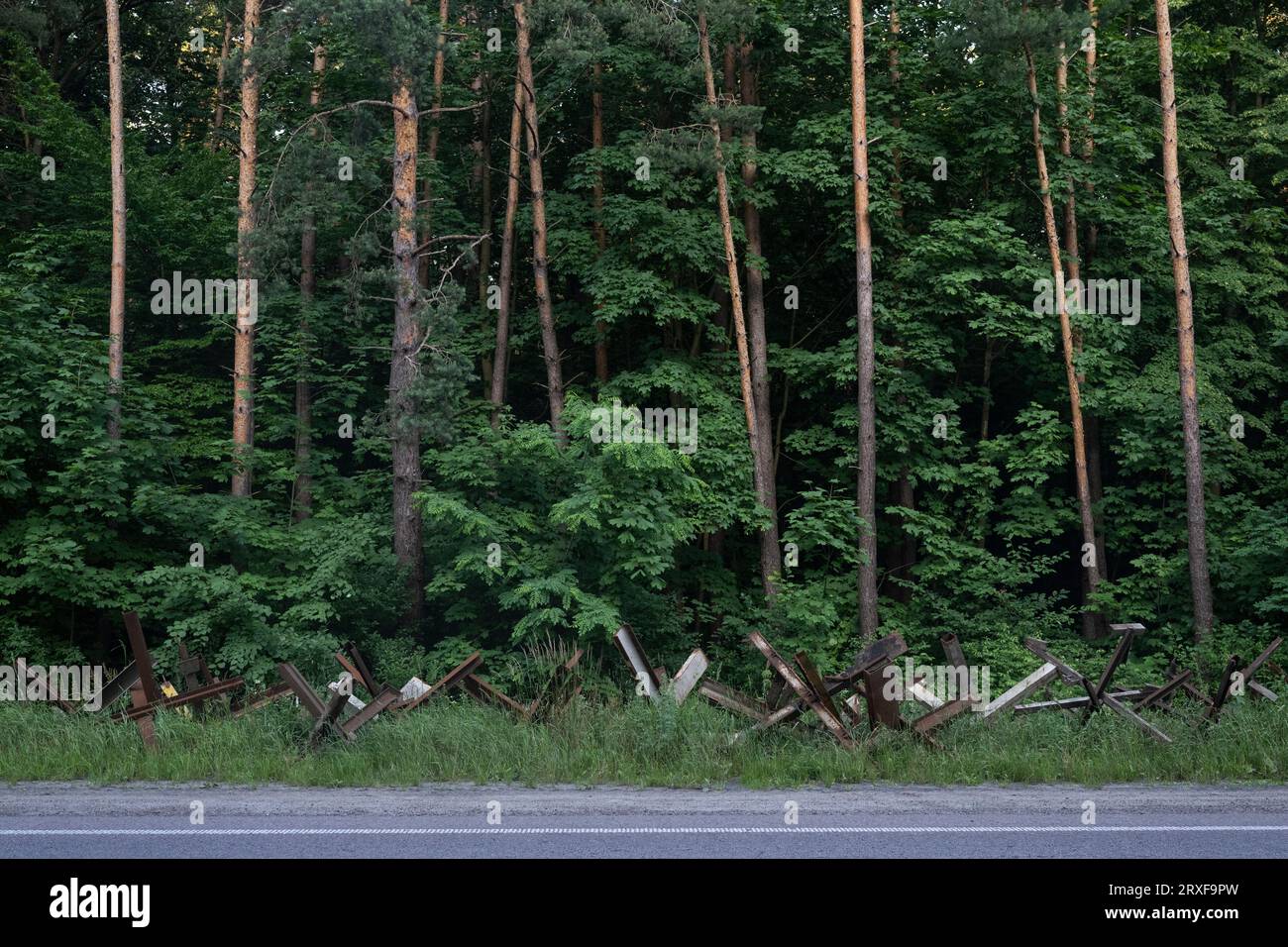 Improvised anti-tank obstacles next to a road near the town of Brody ...
