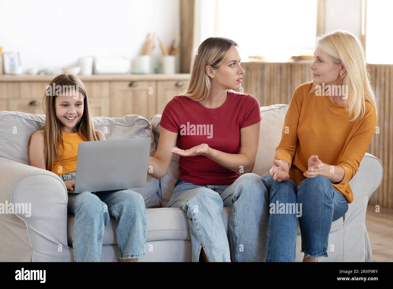 Worried grandmother with daughter hi-res stock photography and images ...