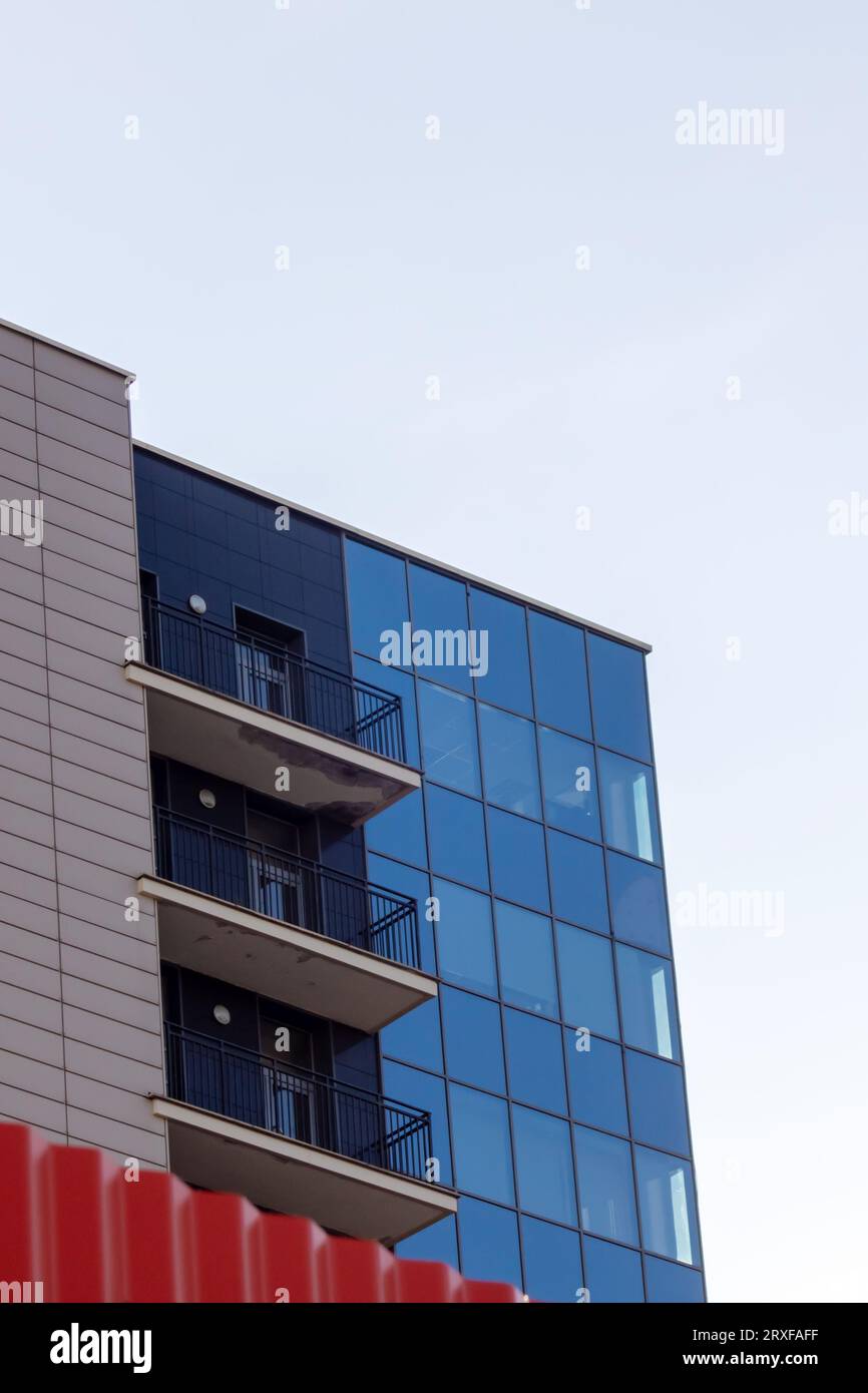 Windows of the upper floors of the high building Stock Photo - Alamy
