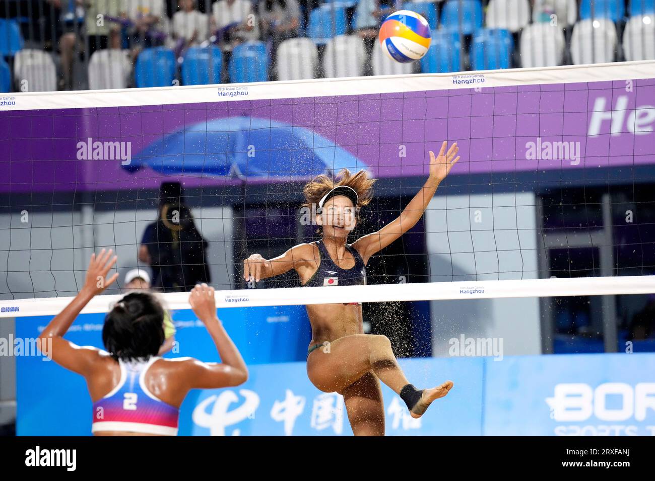 Japan's Miki Ishii, right, who paired with Sayaka Mizoe, not in picture ...