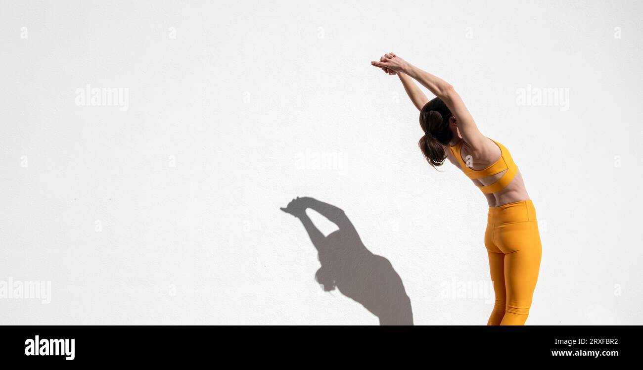 Female bending over hi-res stock photography and images - Alamy