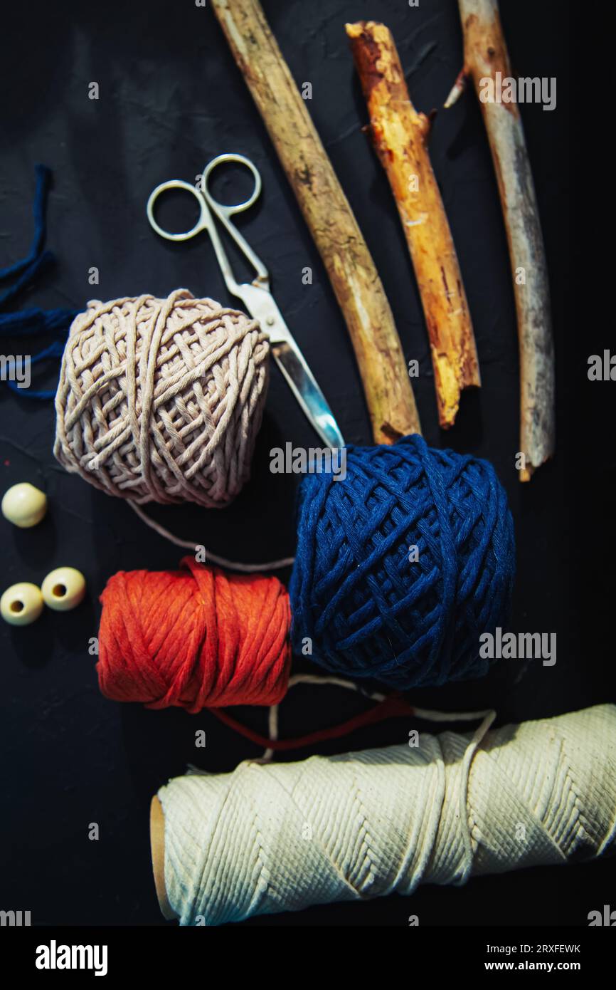 Tools for weaving in macrame technique. Cotton cords, scissors ...