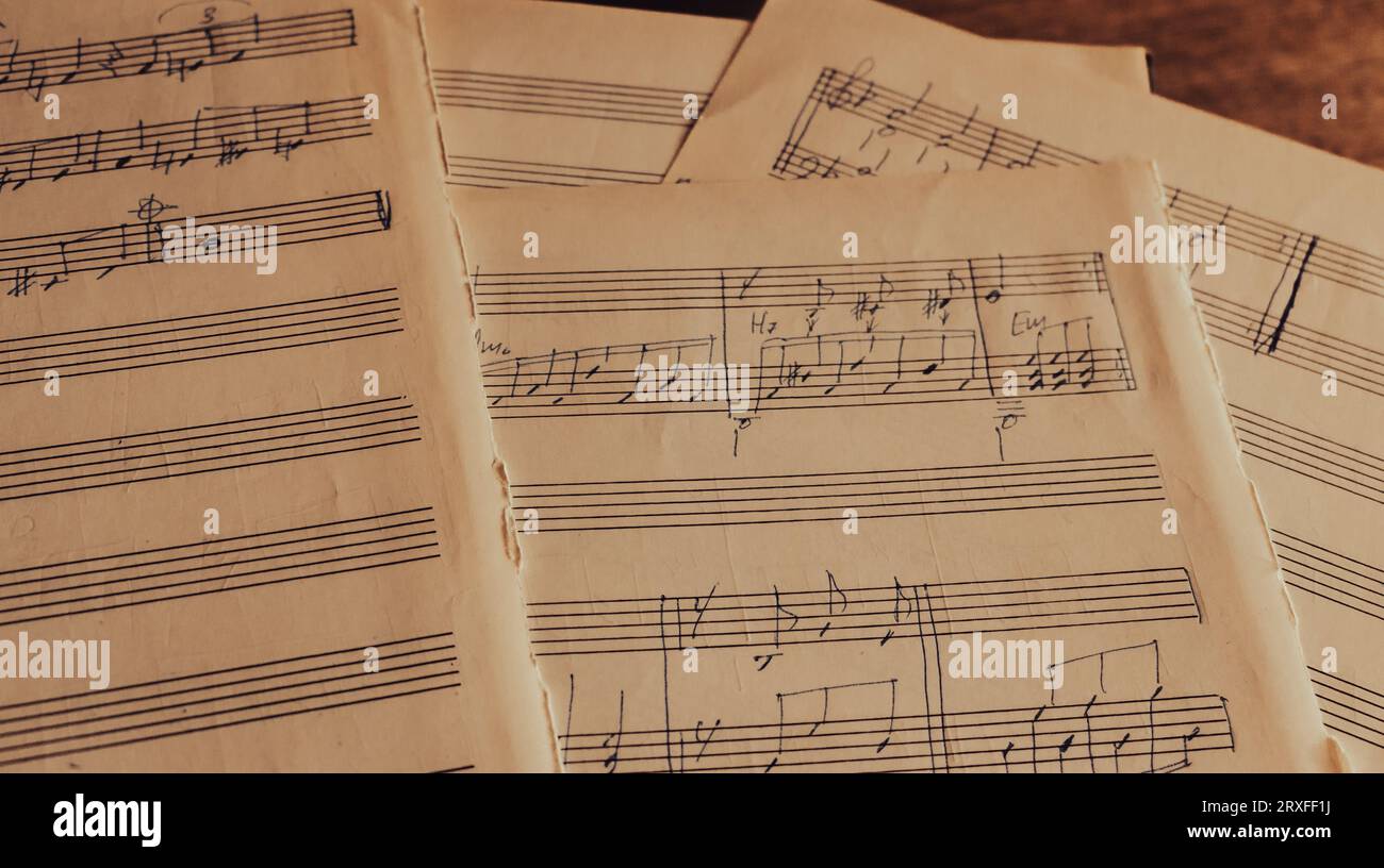 Notes on paper. Old music sheet. Melody on page. Notes and lines. Music ...