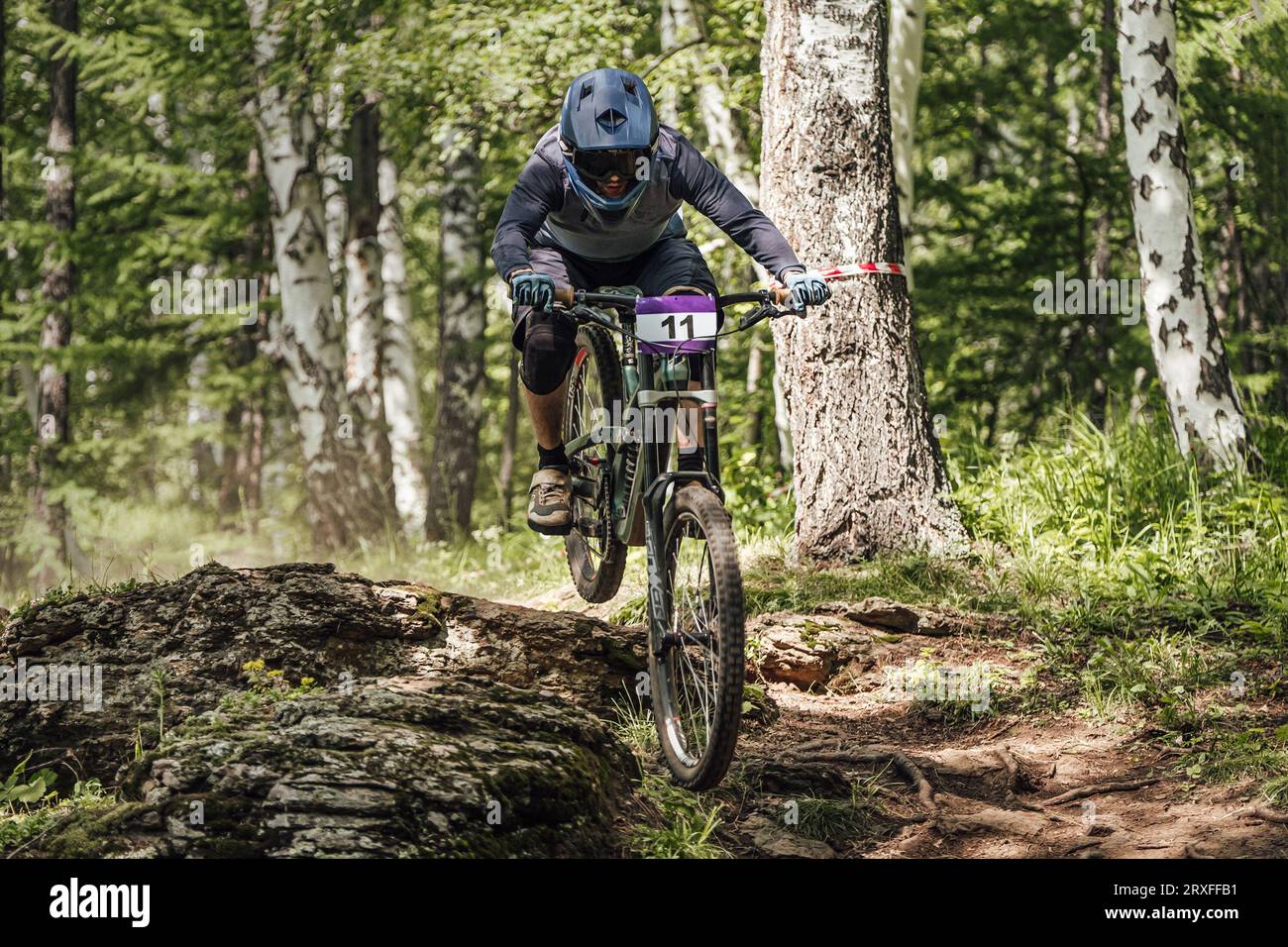 racing mtb mountain bike, athlete rider downhill forest trail, extreme ...