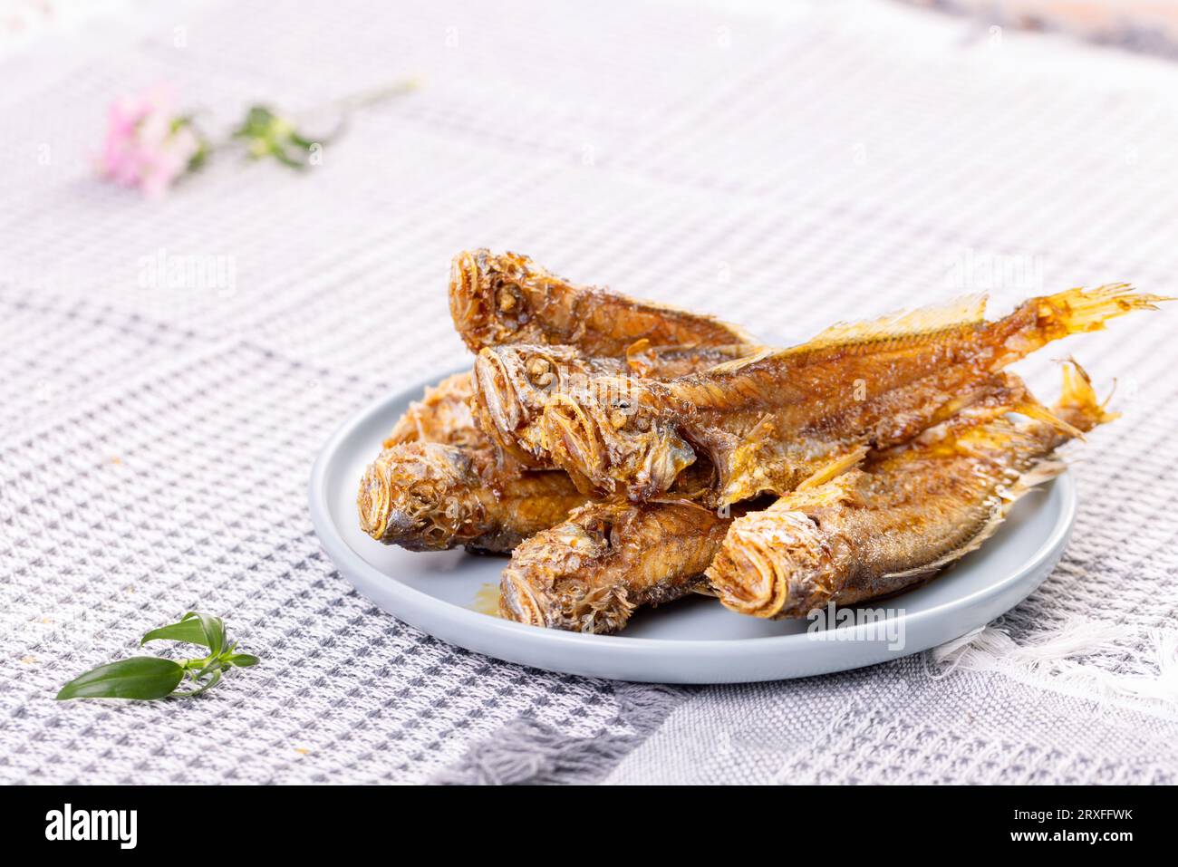 Deep-fried Small Yellow Croakers with spicy salt Stock Photo - Alamy