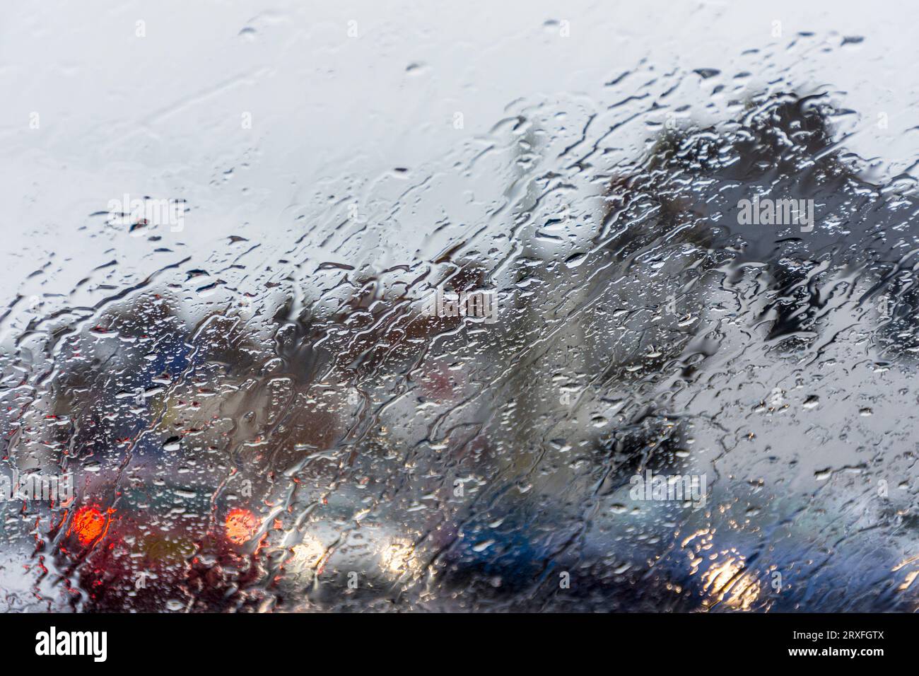 Rain in traffic looking through car windscreen, Northern Ireland Stock ...