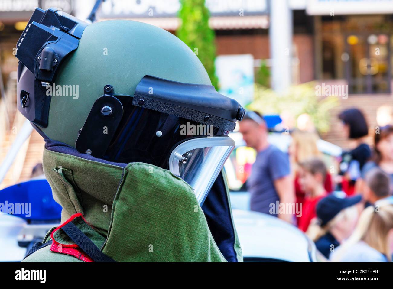Armor costume consisting of a steel helmet. The concept of demining of ...