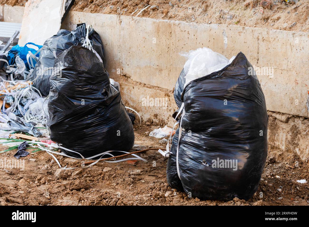 plastic bags with garbage. dump. Heap of waste. Concept environmental ...