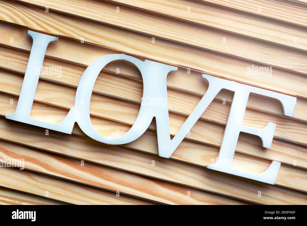 Wooden background with an inscription love. Love text sign. wooden ...