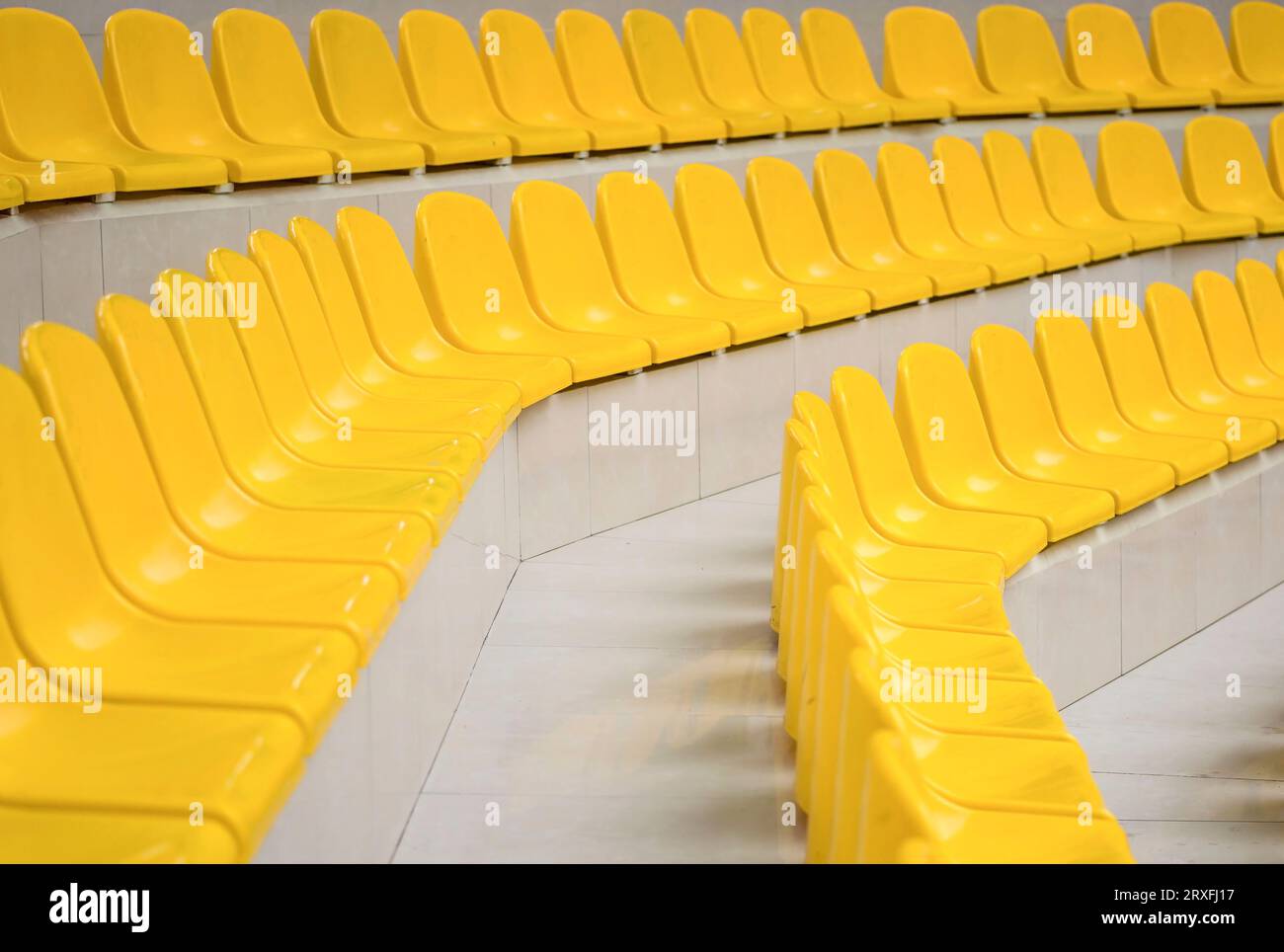 Yellow seats. Blank spaces for the audience. Stands.tribune; bleachers ...