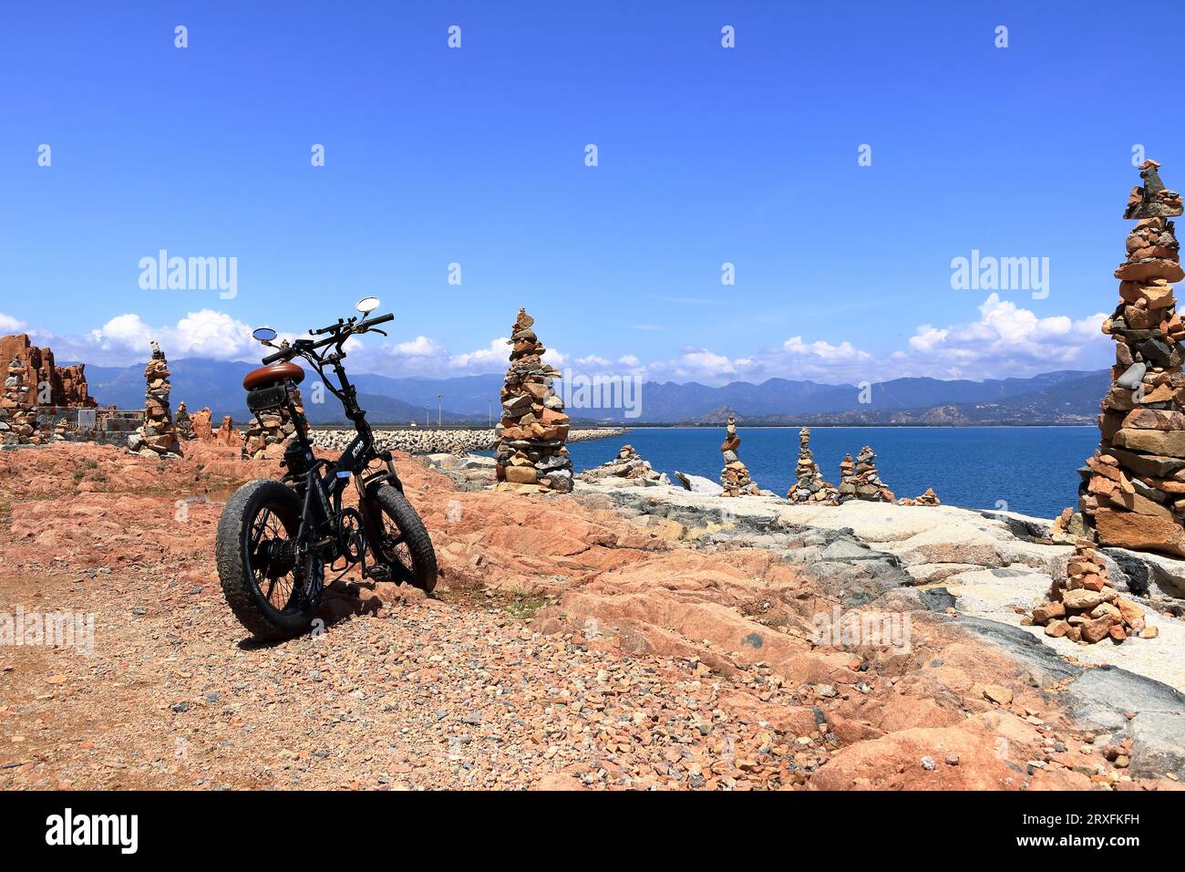 a Bike in front of Red Rocks (called "Rocce Rosse") in Arbatax ...