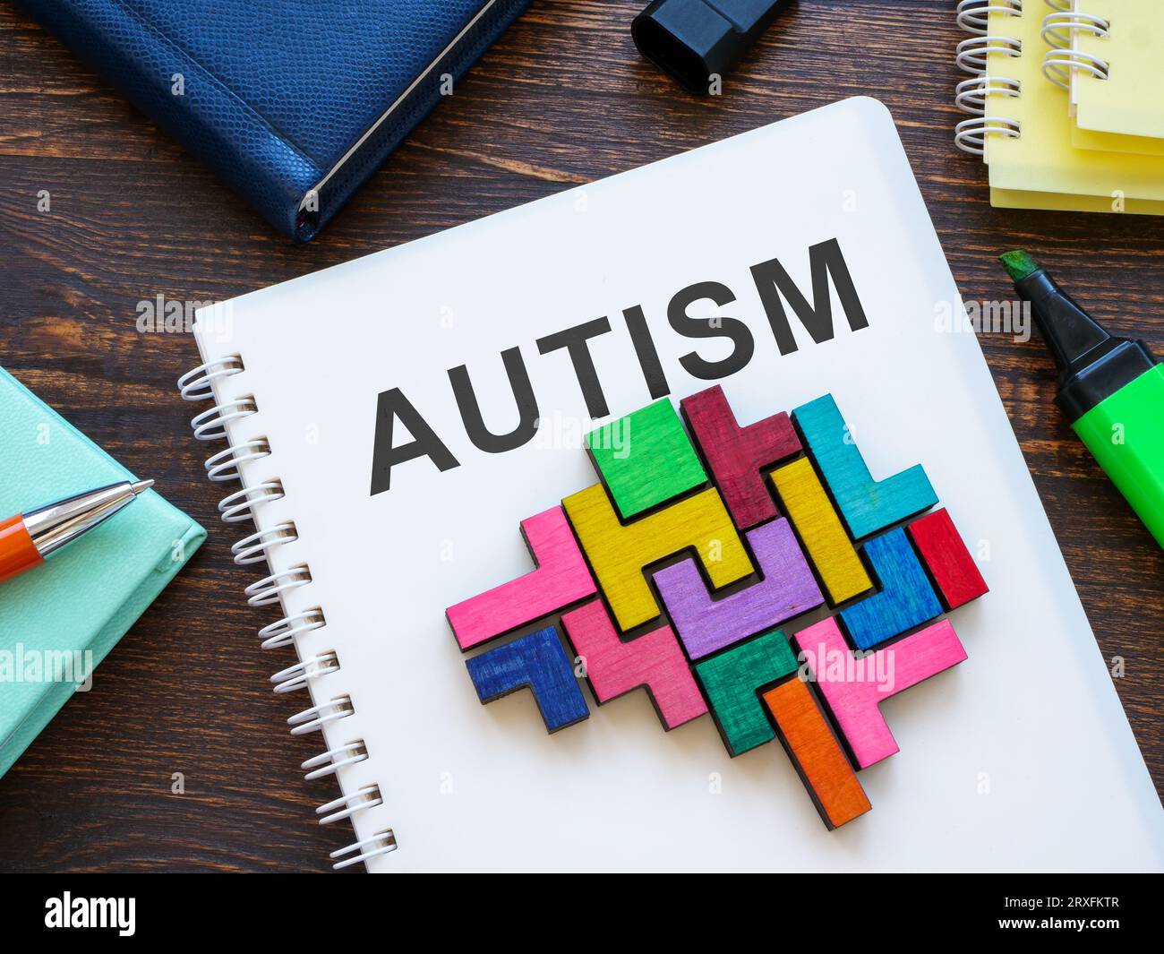 Book about autism and the brain made of colorful cubes Stock Photo - Alamy