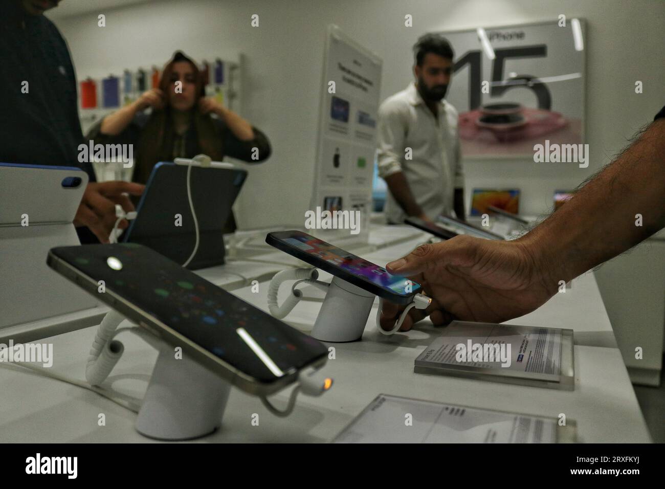 September 23,2023, Srinagar Kashmir, India : A man checks Apple's ...
