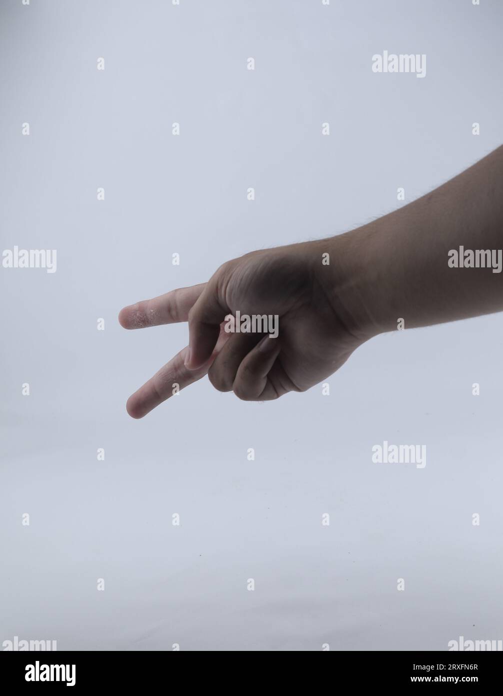 two finger symbol isolated on white background Stock Photo - Alamy