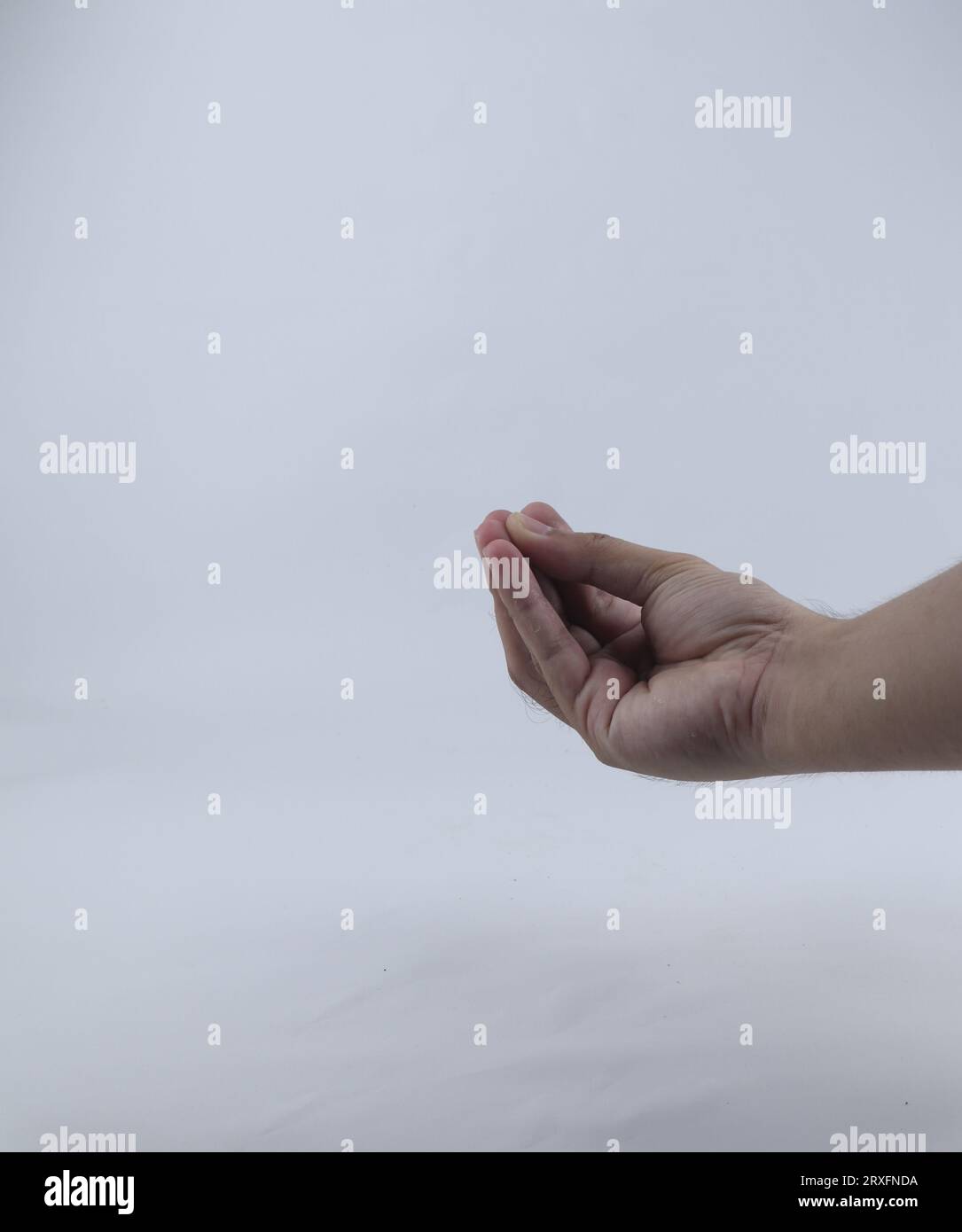 Hand of showing fingers over an isolated white background doing Italian ...