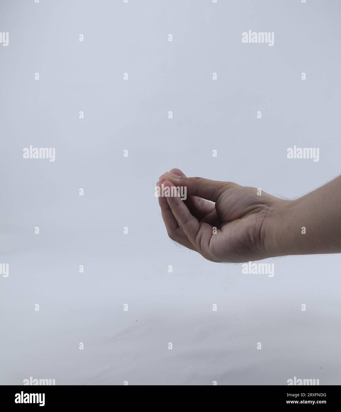 Hand of showing fingers over an isolated white background doing Italian ...