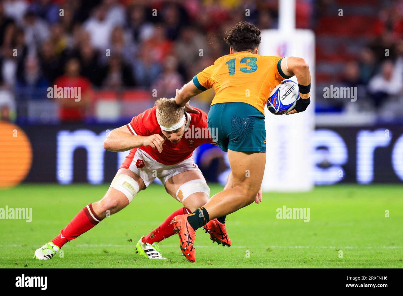 Lyon, France. 24th Sep, 2023. Aaron Wainwright #6 of Wales and Jordan ...