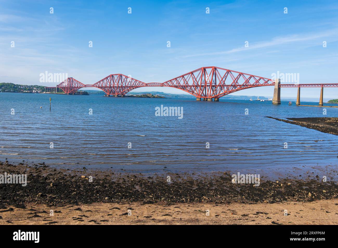 The Forth Bridge across Firth of Forth estuary from South Queensferry ...