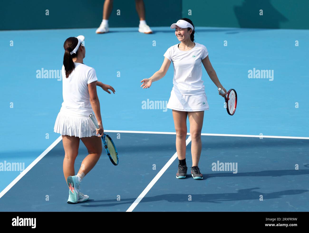 Hangzhou, China's Zhejiang Province. 25th Sep, 2023. Kobori Momoko (R)/Shimizu Ayano of Japan ...