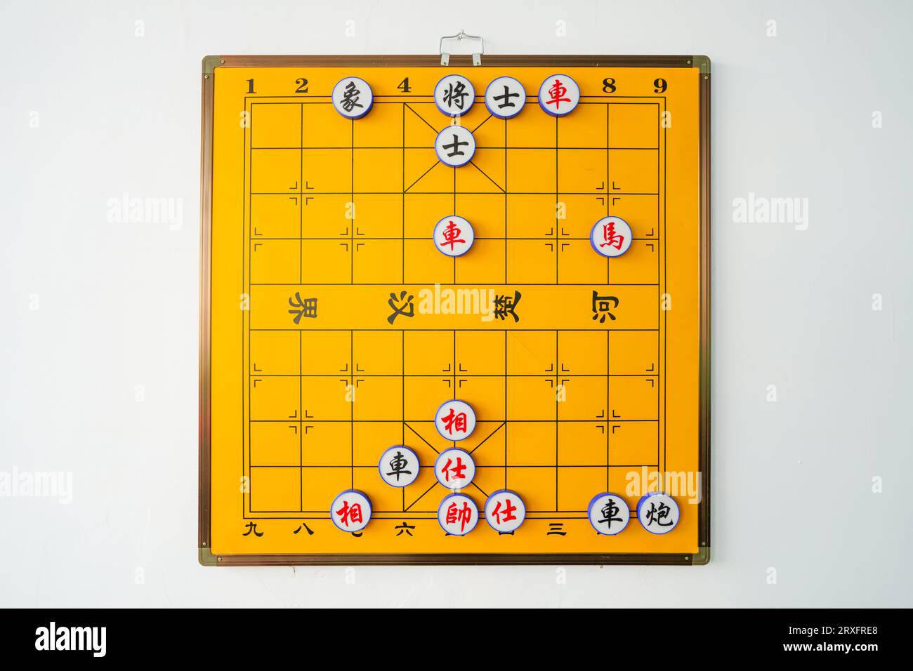 Chinese chess pieces on the chessboard Stock Photo - Alamy