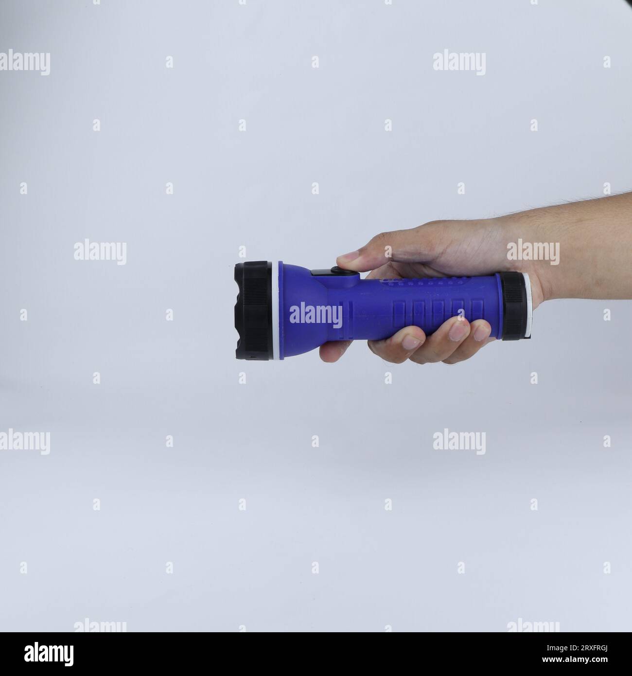 hand holding a flashlight isolated on a white background Stock Photo ...