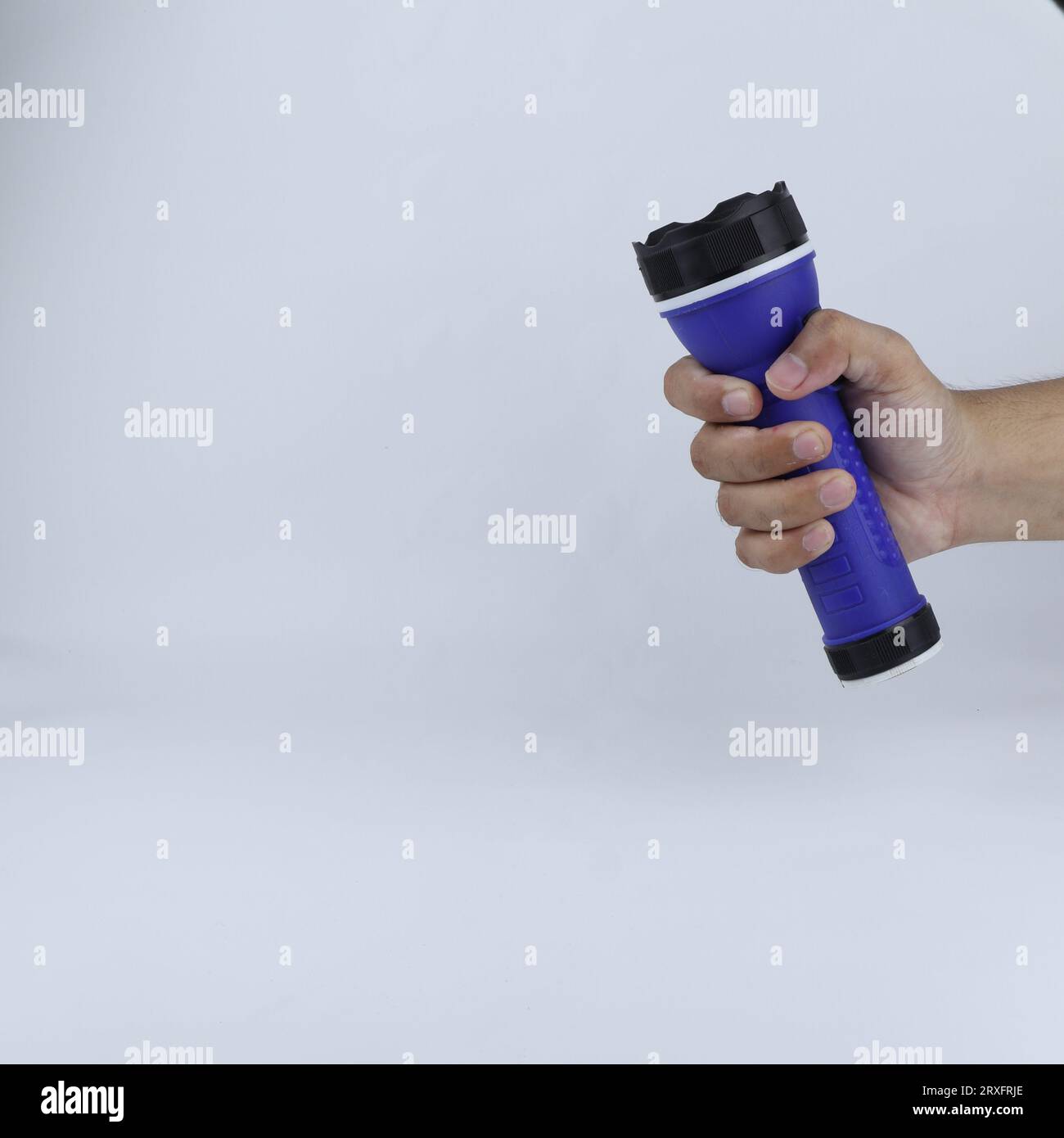 hand holding a flashlight isolated on a white background Stock Photo ...