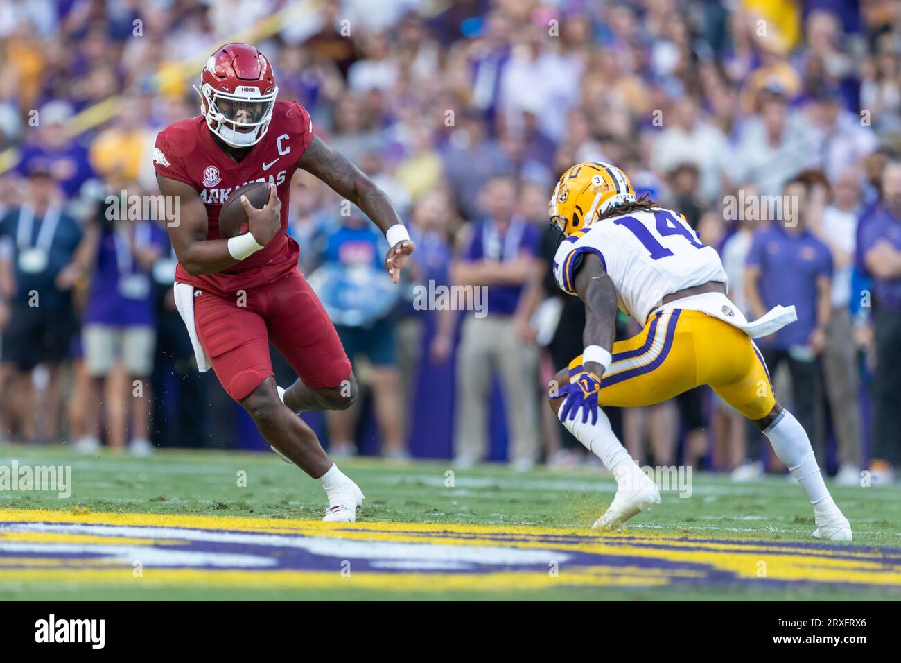 Arkansas Razorbacks quarterback KJ Jefferson (1) carries the ball as ...