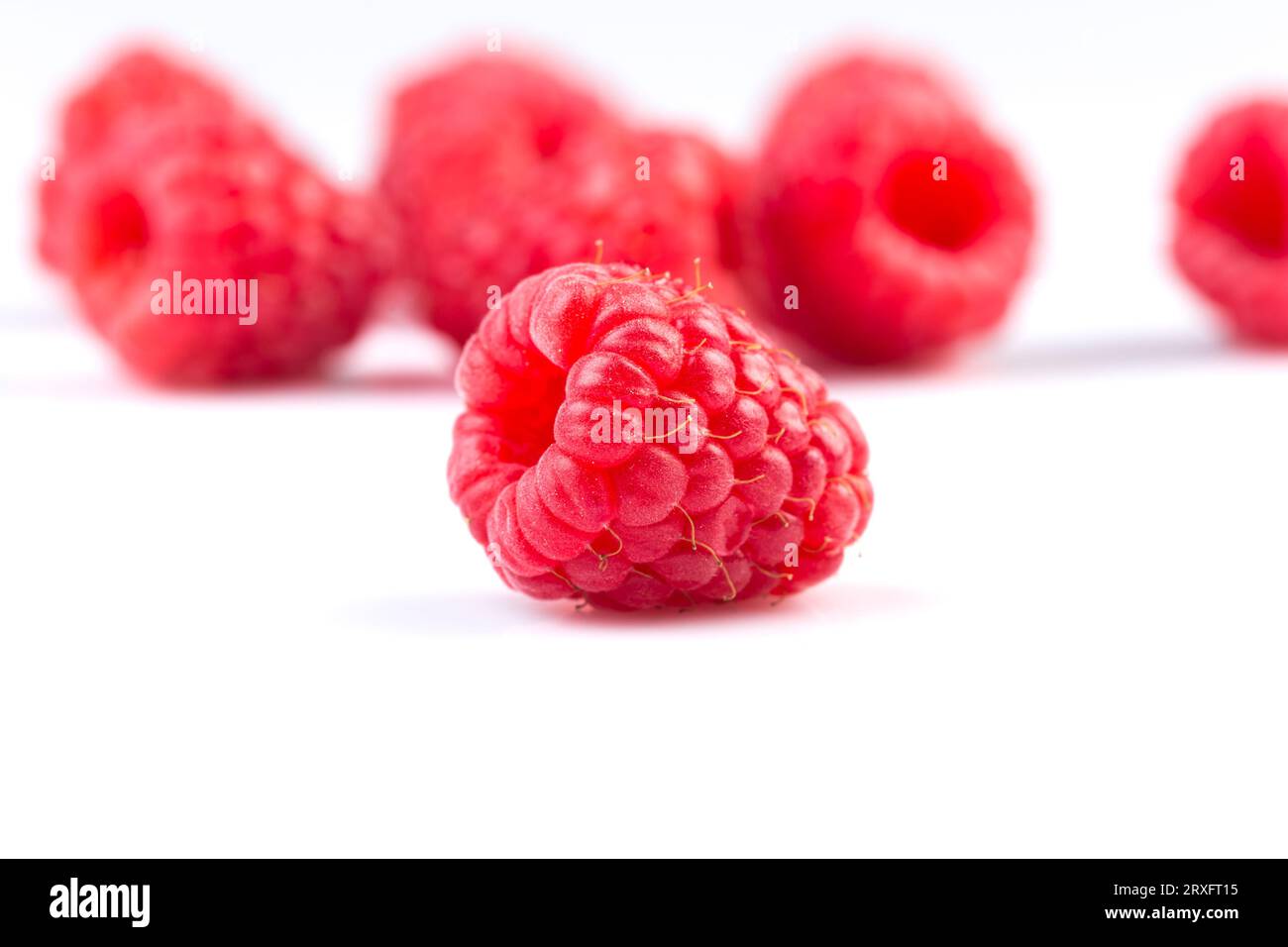 Fresh raspberry isolated on a white background Stock Photo - Alamy