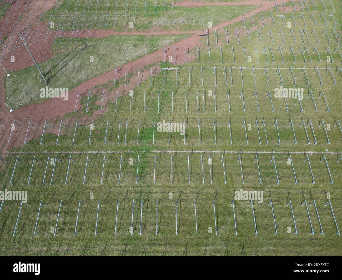 Aerial view of solar energy farm under construction at Dormington ...