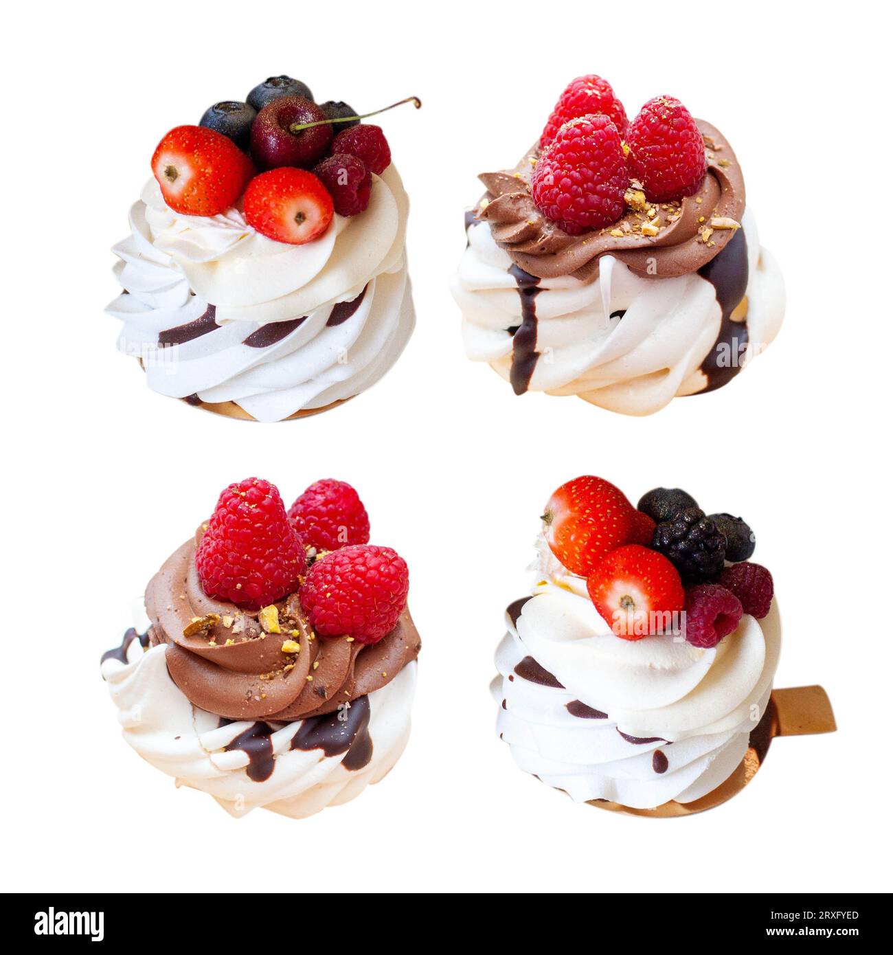 Vanilla and chocolate mini pavlova cakes with whipped cream decorated ...