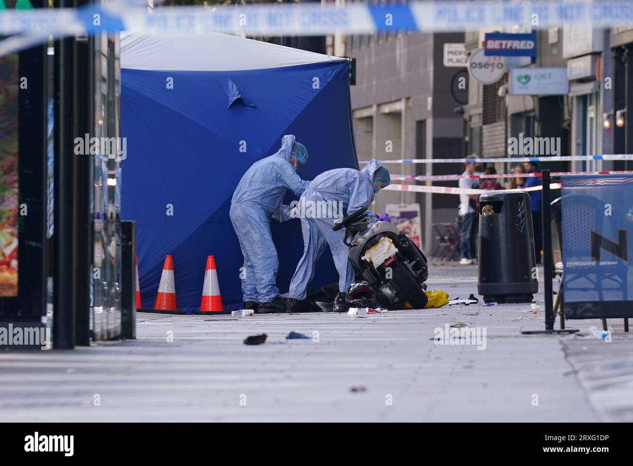 Police forensic officers at the scene of a fatal collision on Tottenham ...