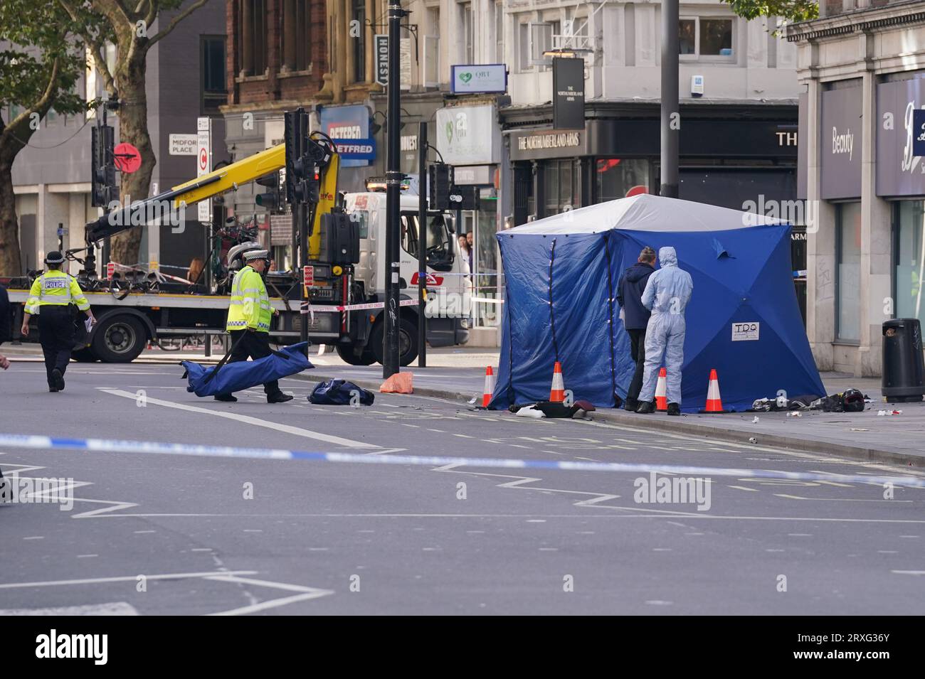 Police forensic officers at the scene of a fatal collision on Tottenham ...