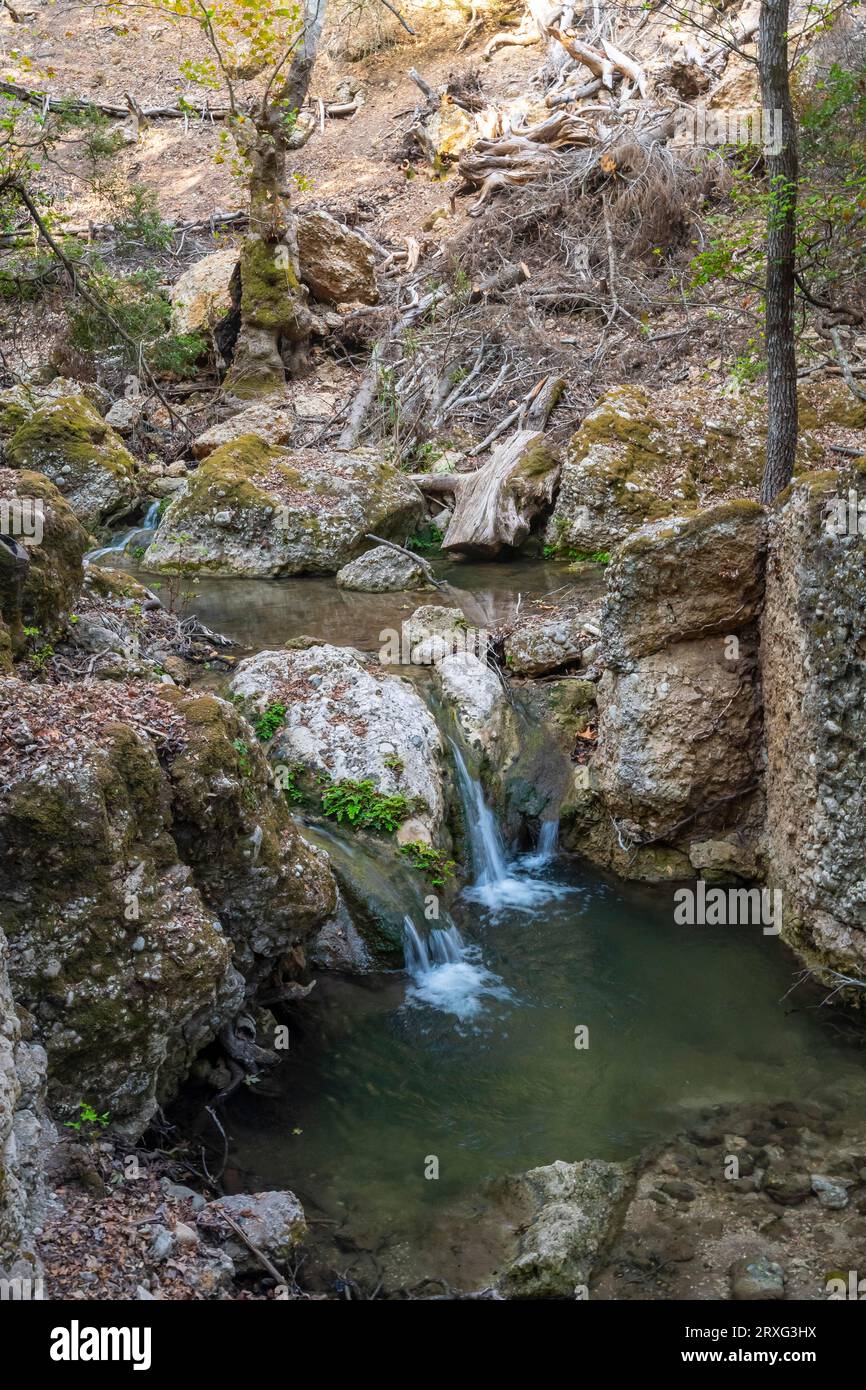 Small waterfall in the valley of the butterflies, Petaloudes, Rhodes ...