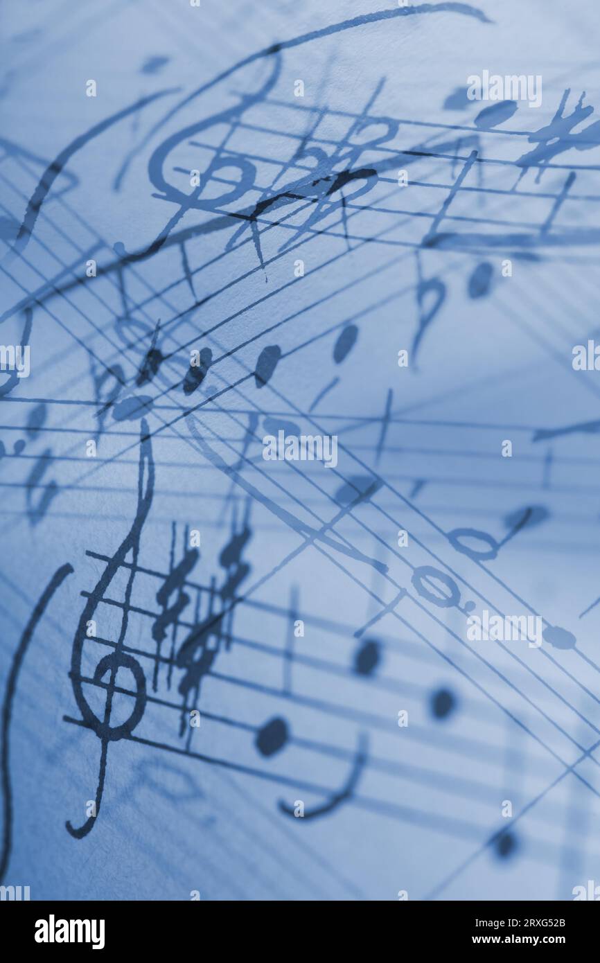Hand-written musical notation background Stock Photo - Alamy