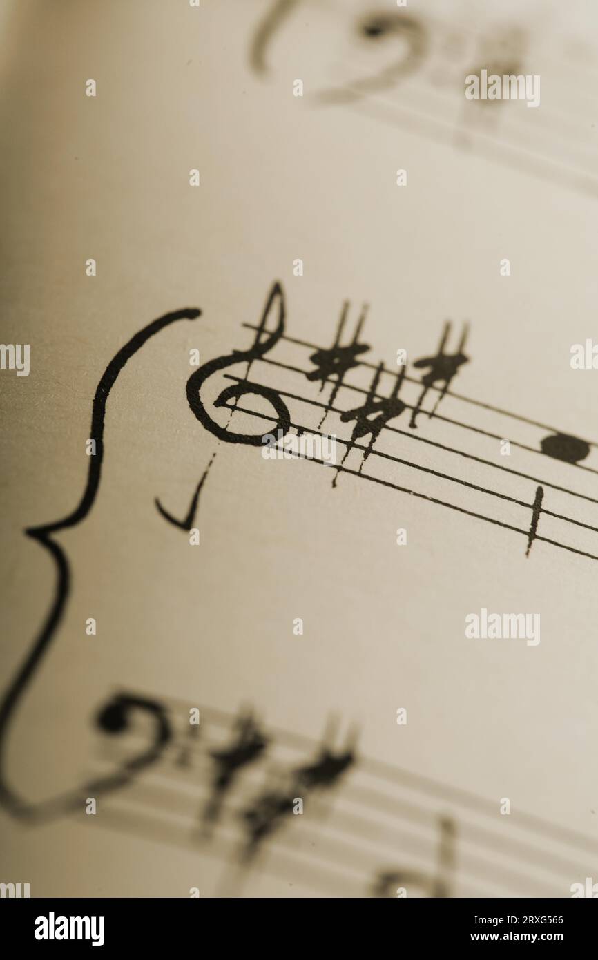 Hand-written musical notation background Stock Photo - Alamy