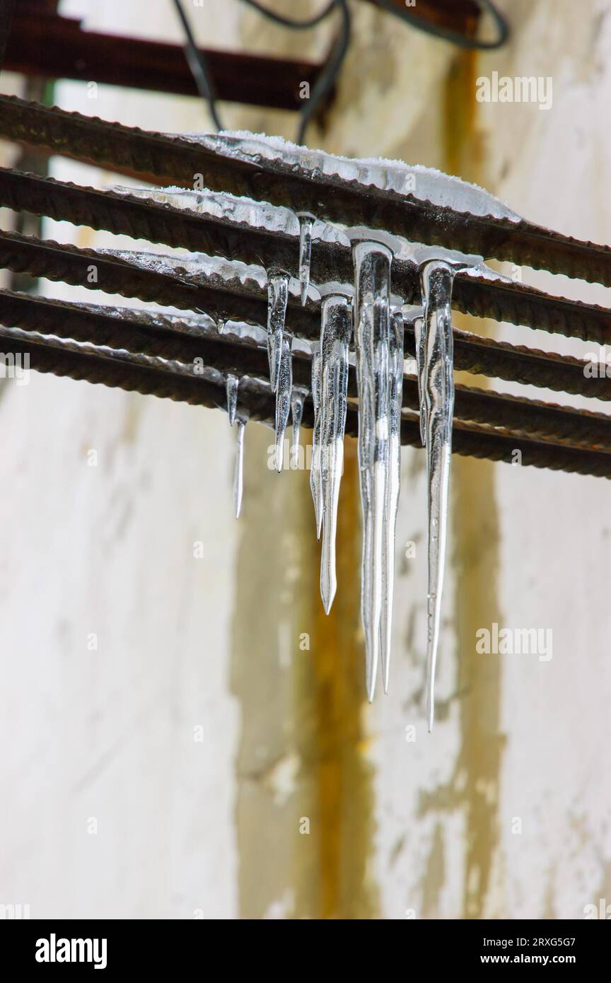 Water stalactites dropping during the cold and gray winter Stock Photo ...