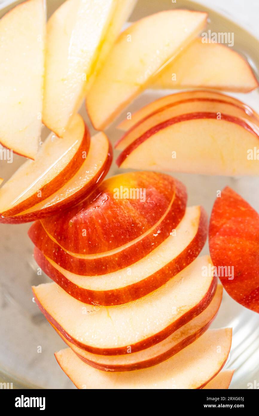 Sliced red apples Stock Photo - Alamy