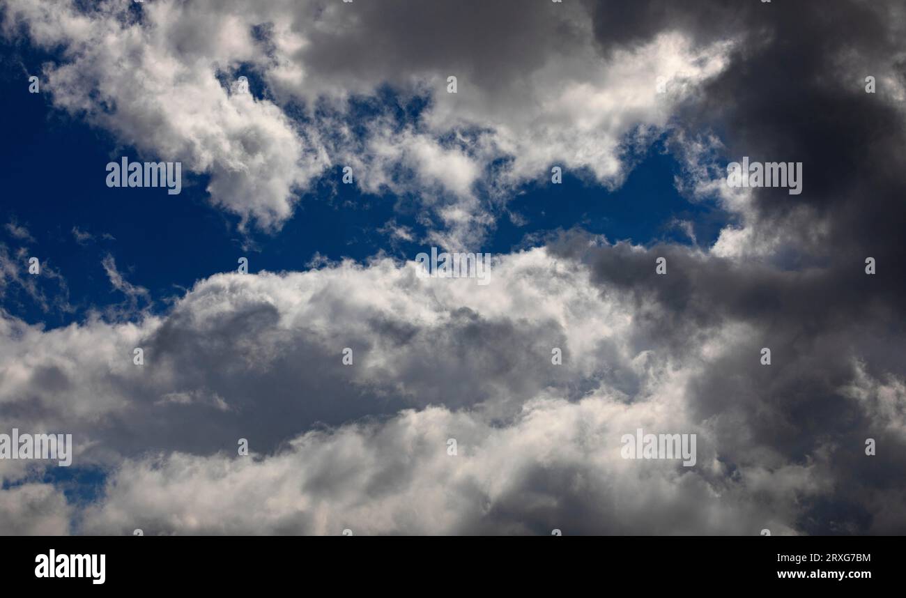 Dramatic cloudscape with (cumulus) clouds, thunderclouds, rain clouds ...