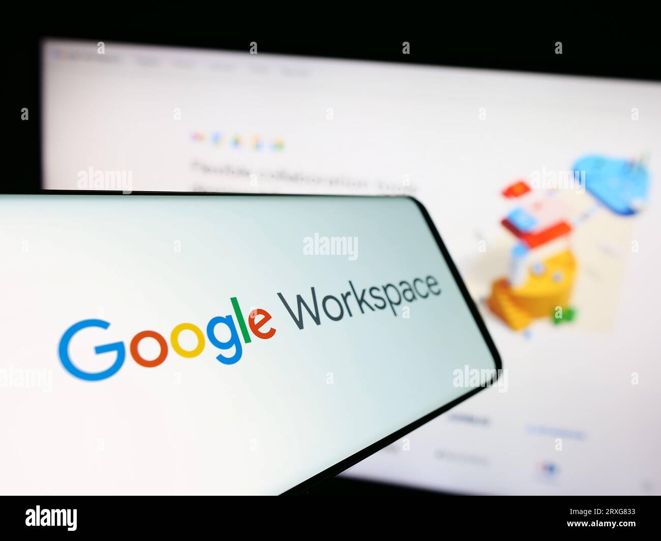 Cellphone with logo of business app software Google Workspace on screen ...