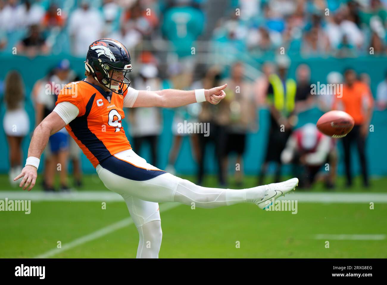 Denver Broncos punter Riley Dixon kicks the ball during the second half ...