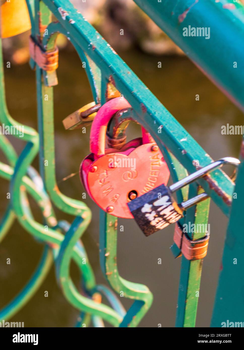 Metal structure where couples locking the locks as a sign of true love ...