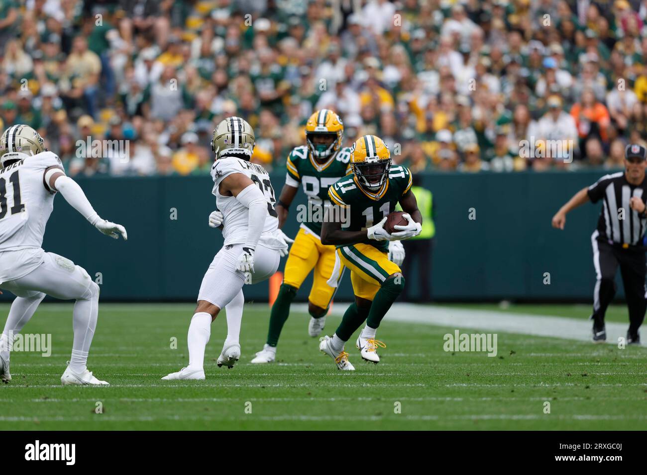 Green Bay Packers wide receiver Jayden Reed (11) runs during a NFL ...