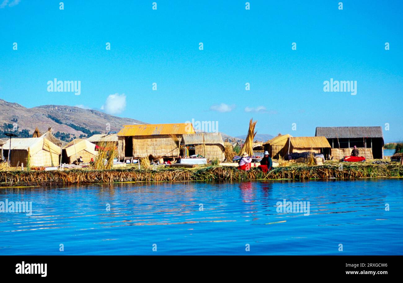 Houses on a floating island built from totora reeds by the Uro people ...