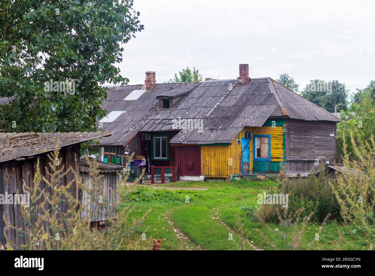 Shot of the old teared huts in the village Stock Photo - Alamy
